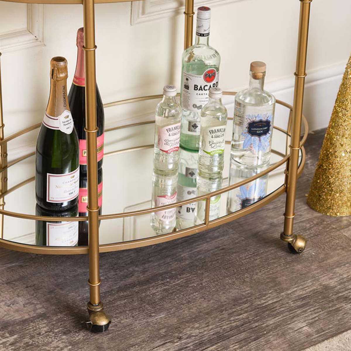 Gold Mirrored Oval Drinks Trolley | Flora Furniture